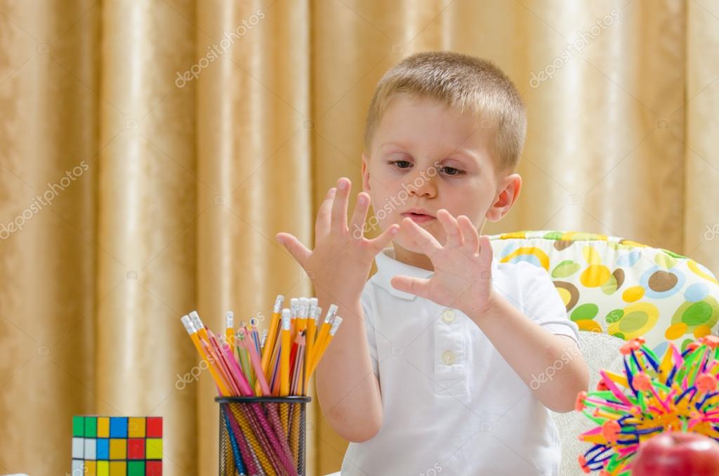 Beautiful child counting on fingers — Stock Photo © skyfotostock1 #29839429
