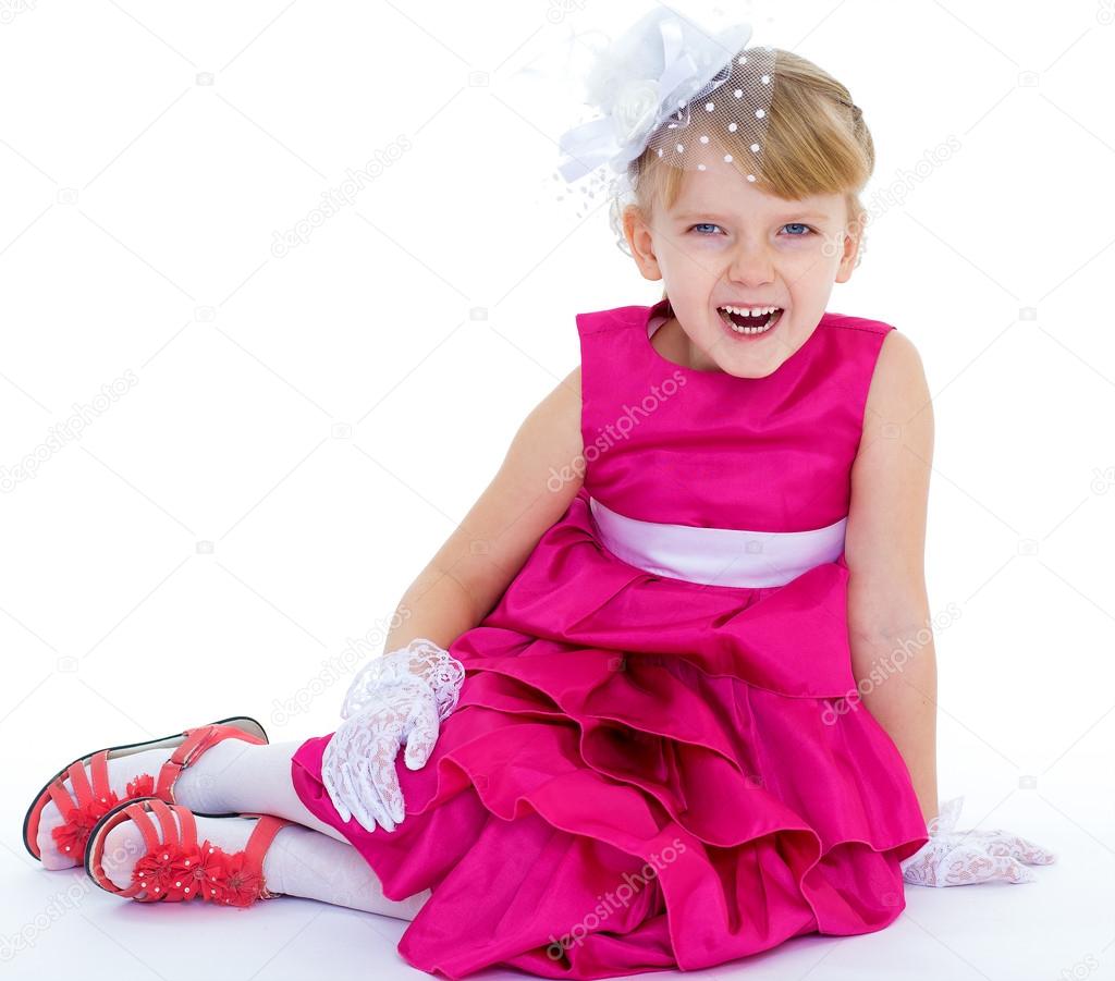 Charming little girl in a red dress and fashionable shlyape. — Stock ...