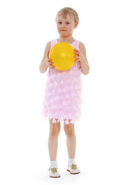 Little girl hugging the ball. — Stock Photo © lotosfoto1 #49156405