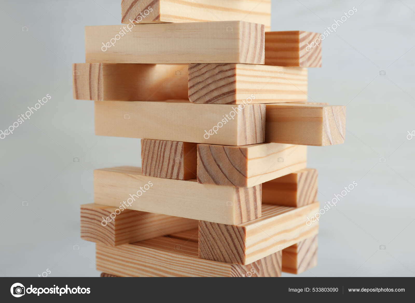 Jenga Tower Made Wooden Blocks White Background Closeup Stock Photo by ...