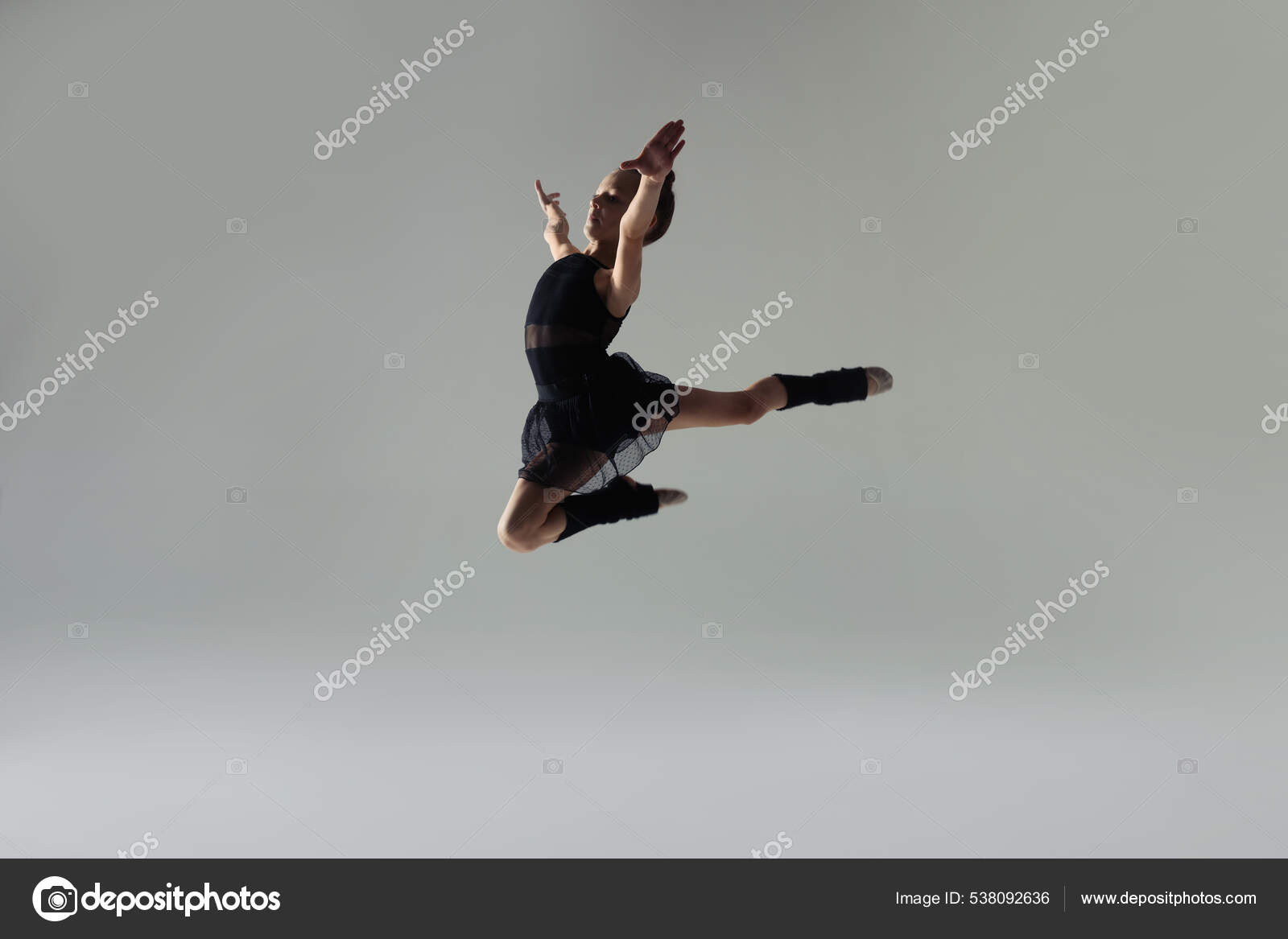 Cute Little Gymnast Doing Stag Leap White Background Stock Photo by ...
