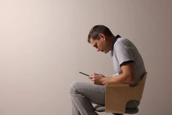 Man Poor Posture Using Laptop While Sitting Chair Grey Background ...