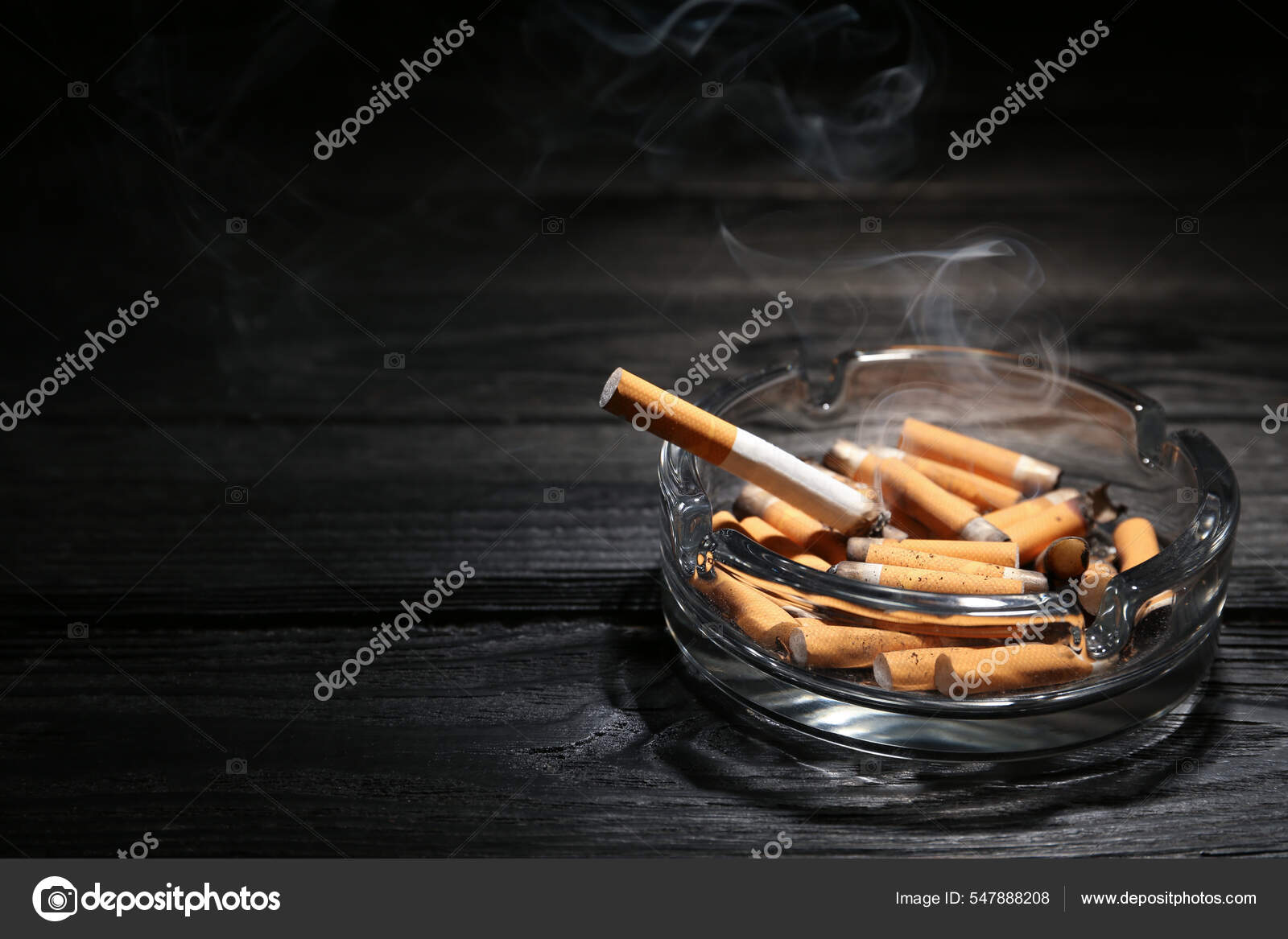Ashtray With Lit Cigarette