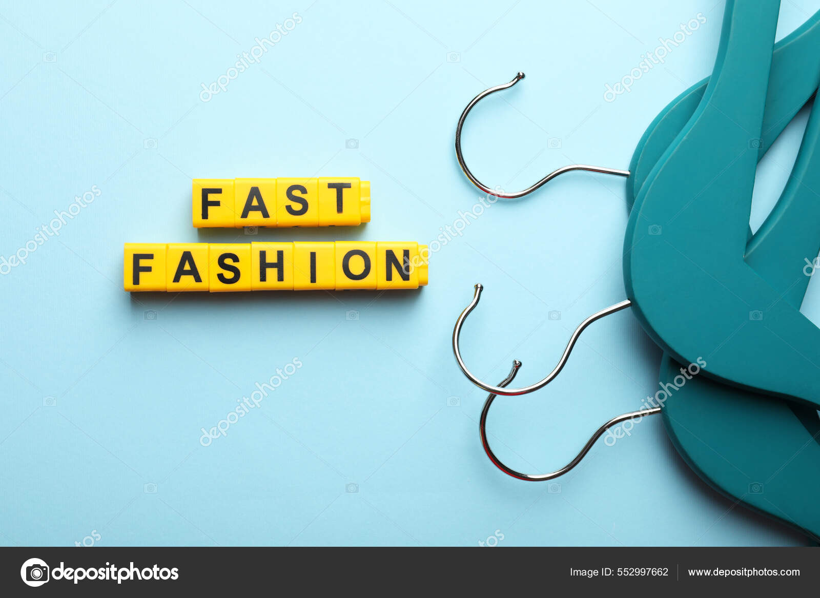 Yellow Plastic Cubes Phrase Fast Fashion Hanger Light Blue Background ...