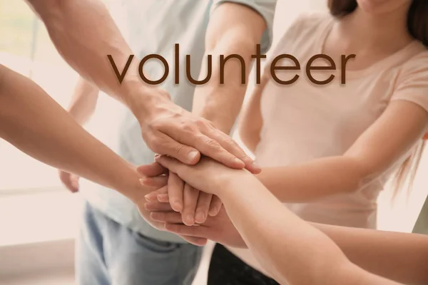 Volunteers helping people Stock Photos, Royalty Free Volunteers helping ...