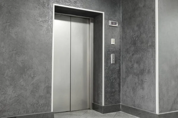 Holding elevator door Stock Photos, Royalty Free Holding elevator door ...