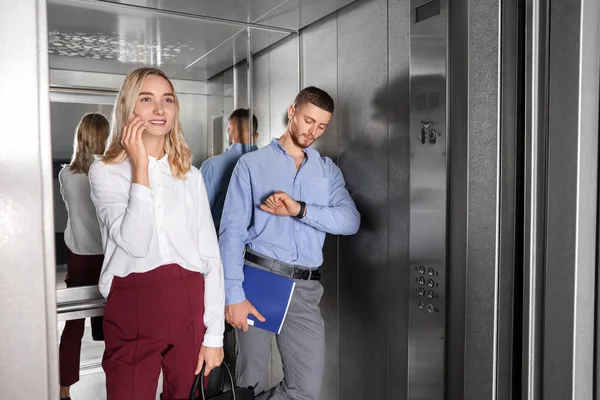 Business in elevator Stock Photos, Royalty Free Business in elevator ...