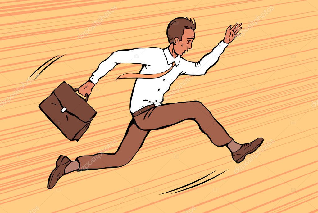 Un joven hombre de negocios con un maletín en la mano tiene prisa ...