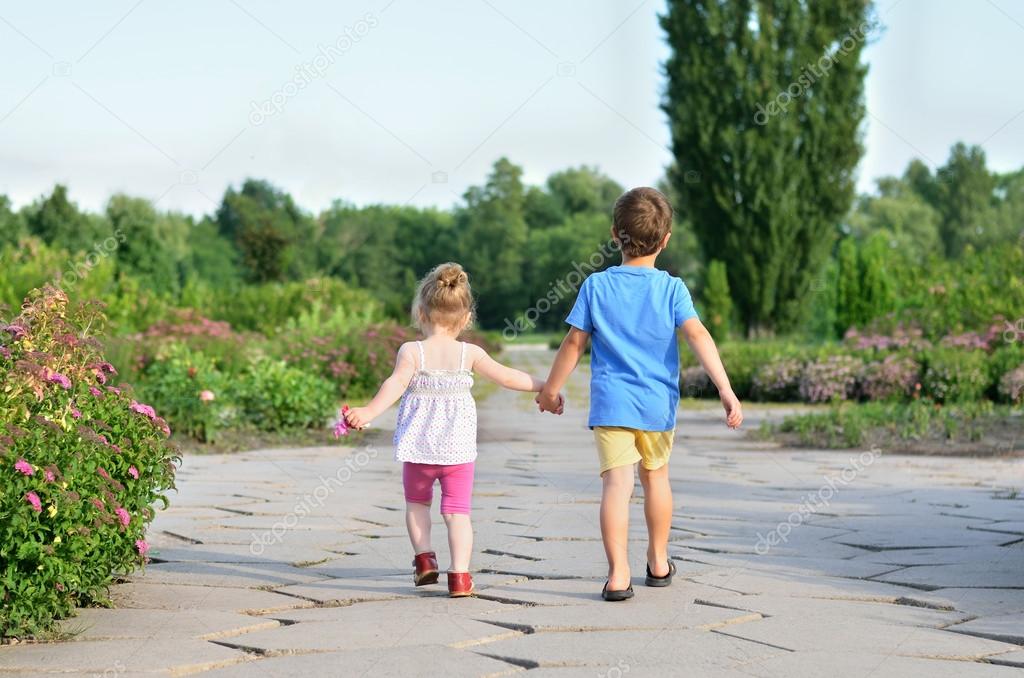 Children walking hand in hand — Stock Photo © odenis83 #44535495