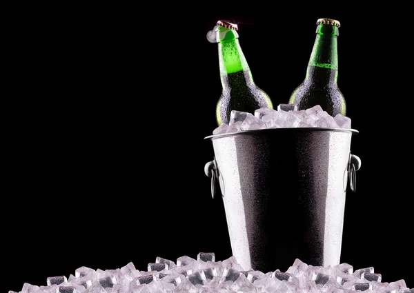 Beer bottles in ice bucket - Stock Image - Everypixel