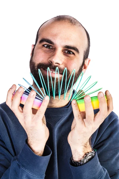 Smiley on a rainbow Slinky toy – Stock Editorial Photo © bluneo #22987550