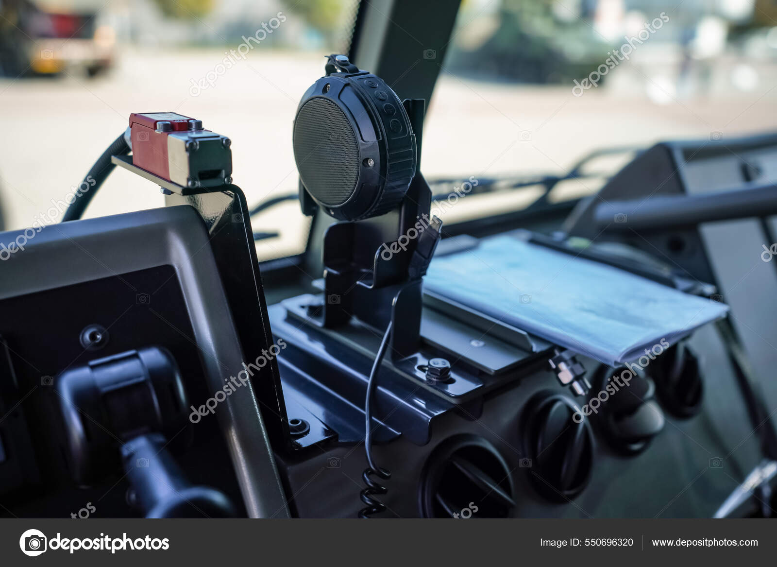 Communication radio transceiver speaker mounted on military vehicle ...