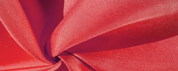 The silk fabric is ruby red. texture of colored silk fabric - can be ...