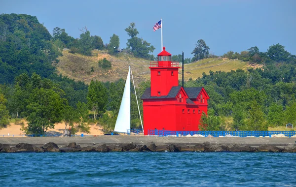 Wave slamming red lighthouse — Stock Photo © jentara #20634053