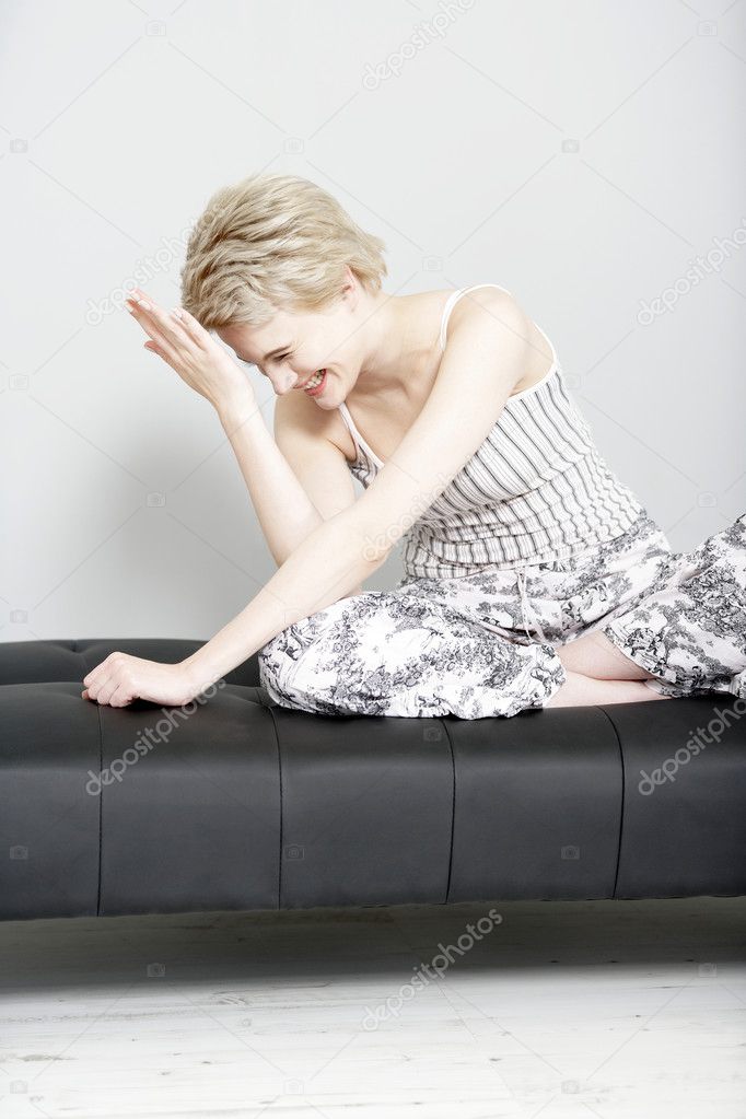 Mujer sentada en sofá: fotografía de stock © studio-fi #38832991 ...