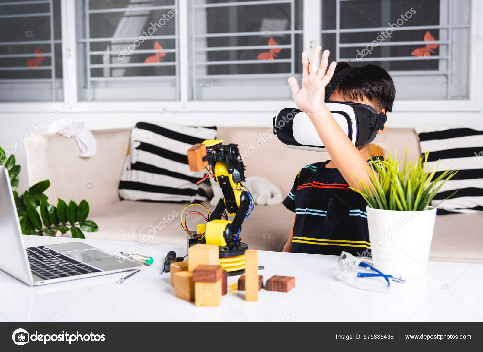 Virtual Reality Simulator Asian Kid Boy Using Glasses Robotic Arm ...
