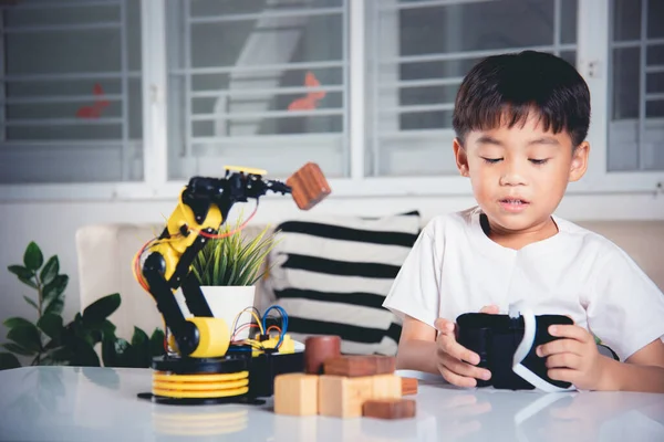 Virtual Reality Simulator Asian Kid Boy Using Glasses Robotic Arm ...