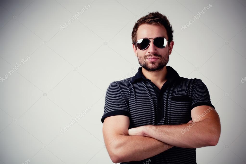 Handsome man with sunglasses Stock Photo by ©baranq 25791605