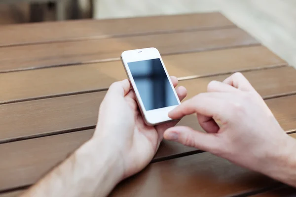 Hands holding and touching smartphone - Stock Image - Everypixel