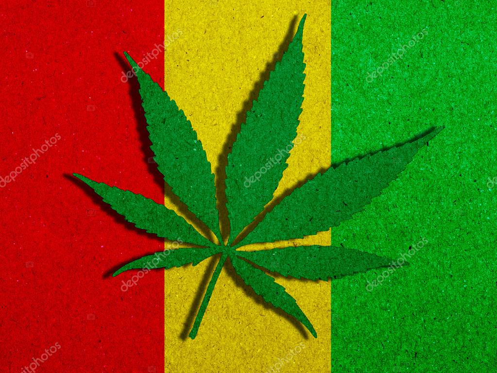 Bandera de rasta de papel de textura de fondo con la silueta de la hoja ...