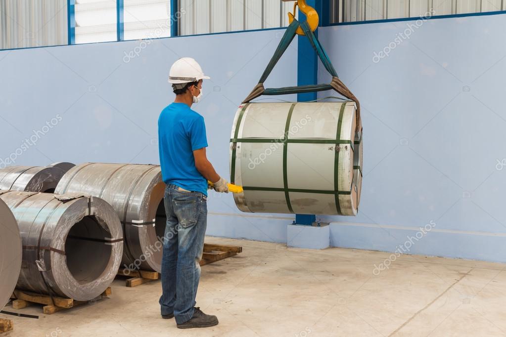 Lifting steel coil — Stock Photo © teptong #39352873