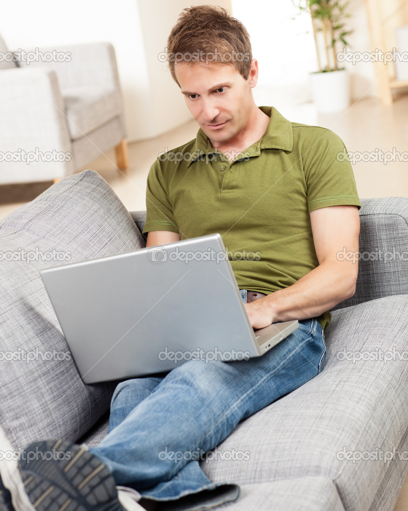Handsome white man at home Stock Photo by ©csavan 12228508