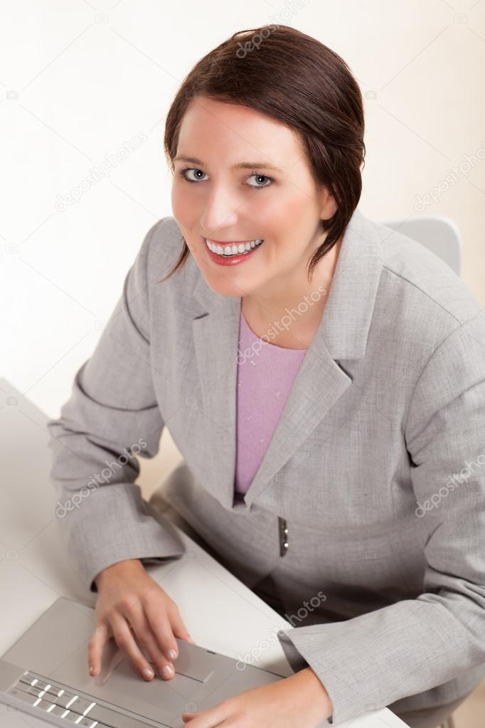 Beautiful white woman at work — Stock Photo © csavan #12427010