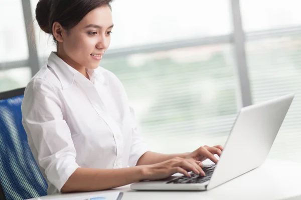 Smiling business woman — Stock Photo © DragonImages #90263742