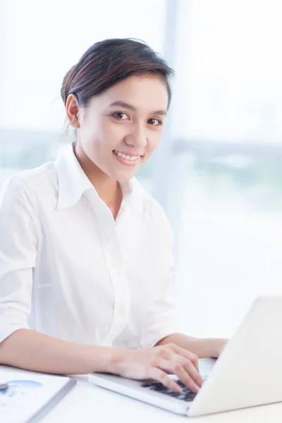 Smiling business woman — Stock Photo © DragonImages #90263742