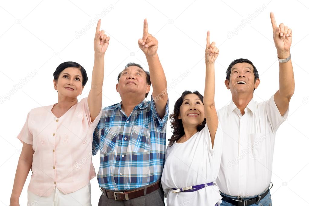 People pointing up | Senior people pointing up — Stock Photo ...