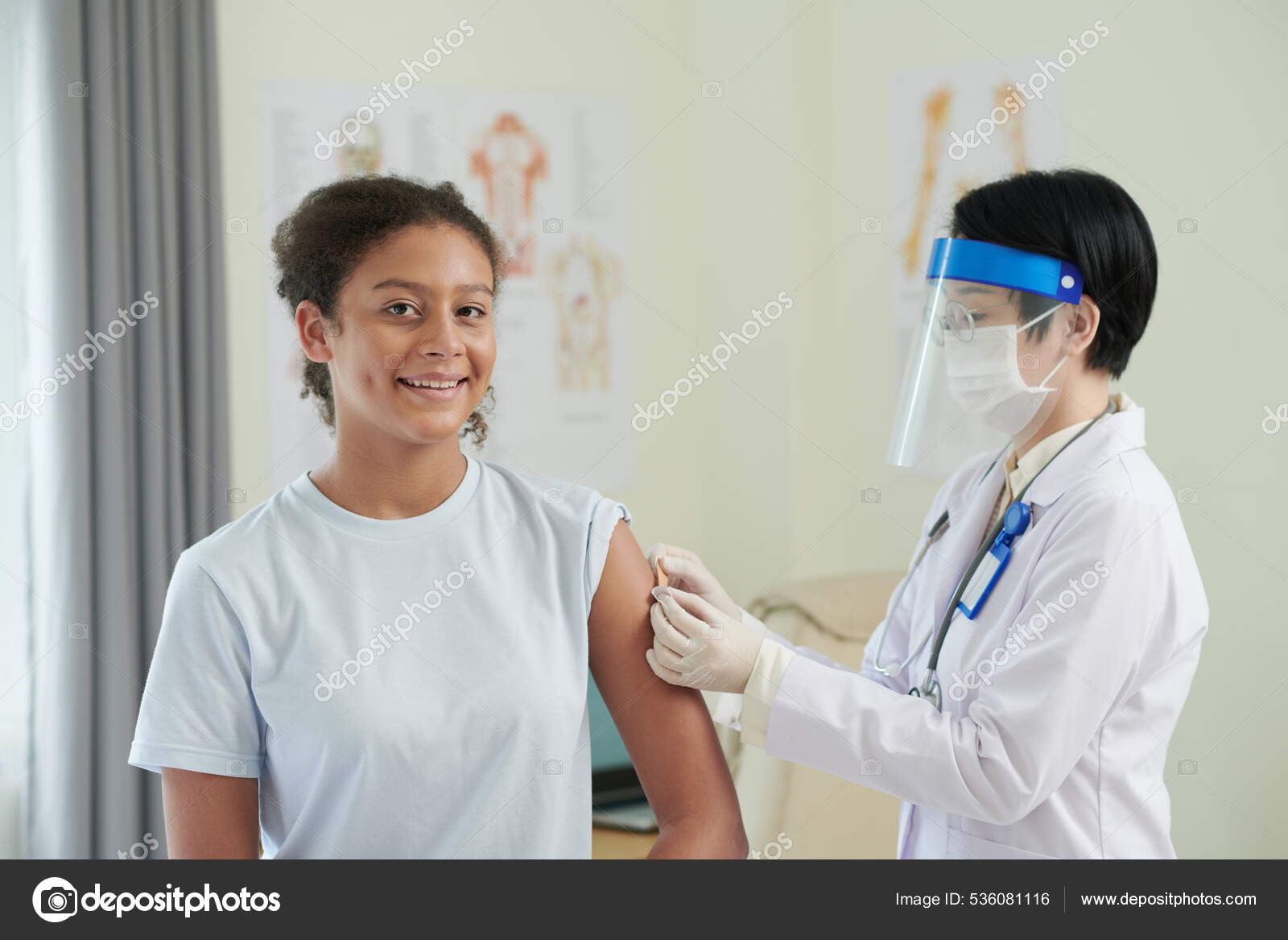 Doctor Sticking Adhesive Plaster Stock Photo by ©DragonImages 536081116