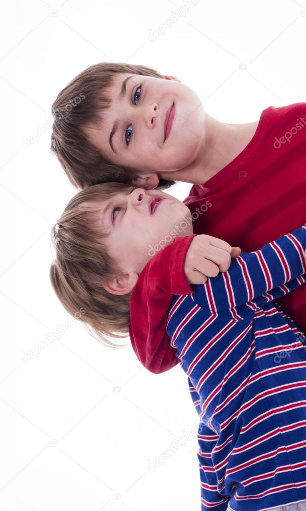 Two brothers hugging Stock Photo by ©vesnac 19210115