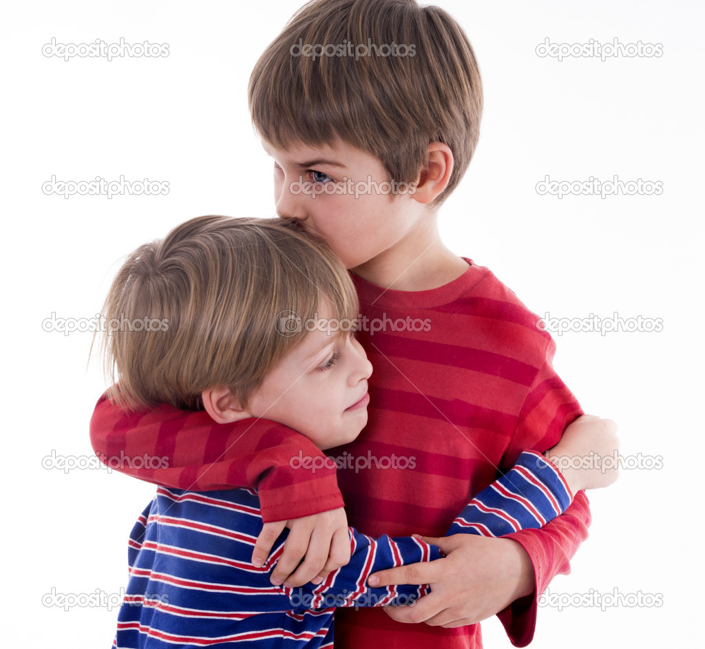 Two brothers hugging Stock Photo by ©vesnac 19210121