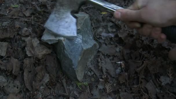 Sharpening axe on stone — Stock Video © gigidread #47692065