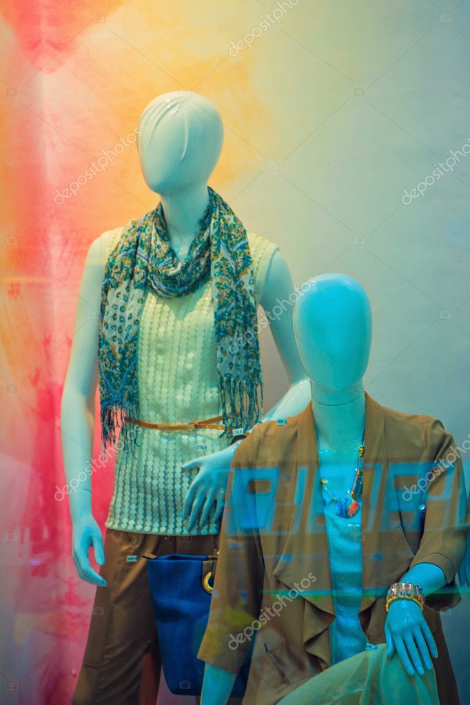 Two dummies in a glass shop — Stock Photo © komsai #44709065