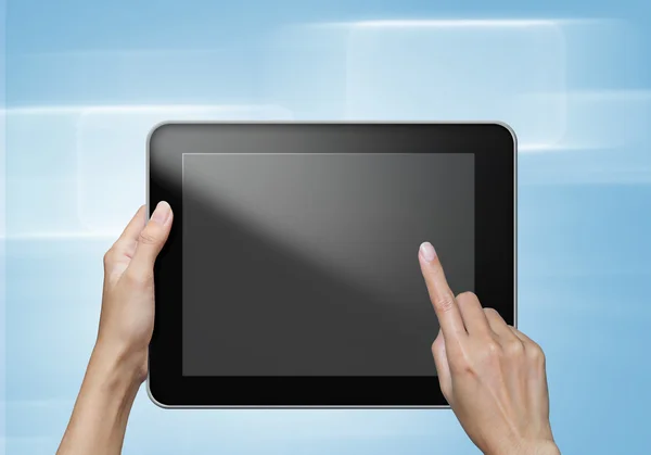 Hand holding tablet — Stock Photo © beachboyx10 #12050100