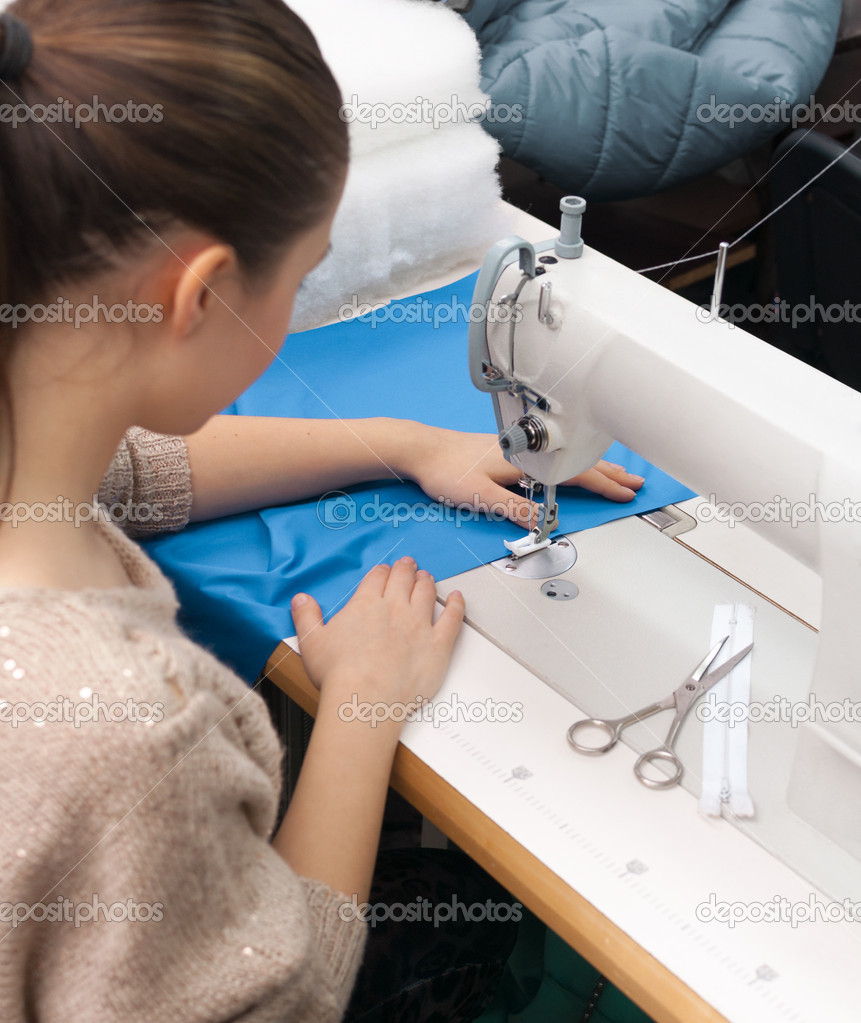 She sews on the sewing machine Stock Photo by ©Artranq 19088735