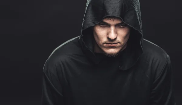 Guy in a black robe Stock Photo by ©Artranq 32717669