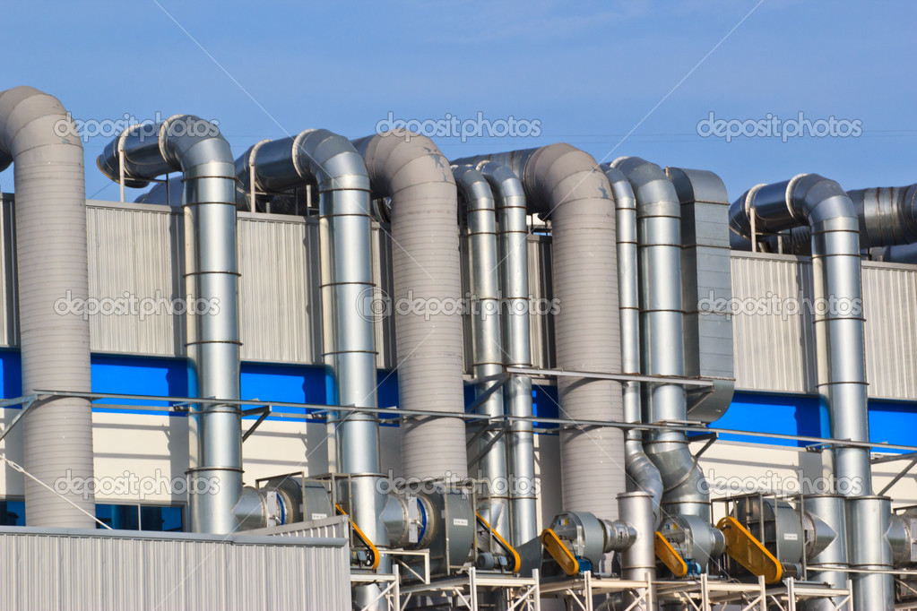 A group pipes and valves in modern factory — Stock Photo © thailandonly ...