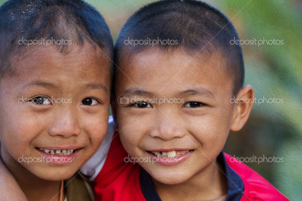 Two little friends hugging each other — Stock Photo © thailandonly ...