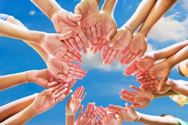 Community helping hands Stock Photos, Royalty Free Community helping ...