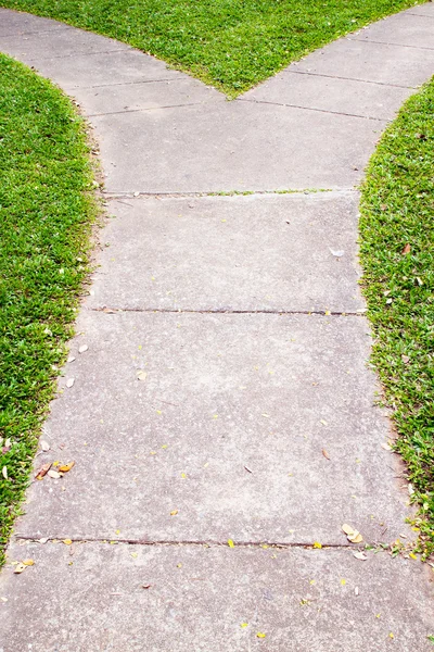 Fork in the pathway with grass — Stock Photo © geargodz #26447031
