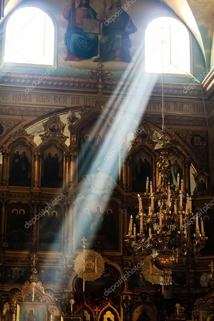 Interior of old orthodox church in Ukraine, dark interior with r ...