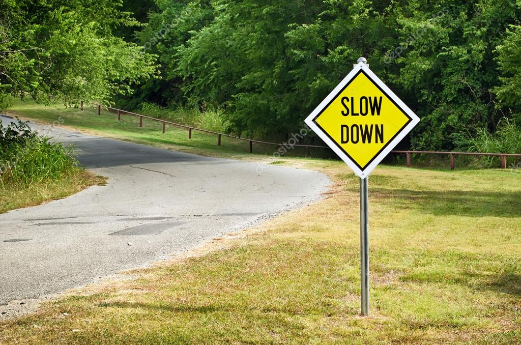 Slow Down Sign