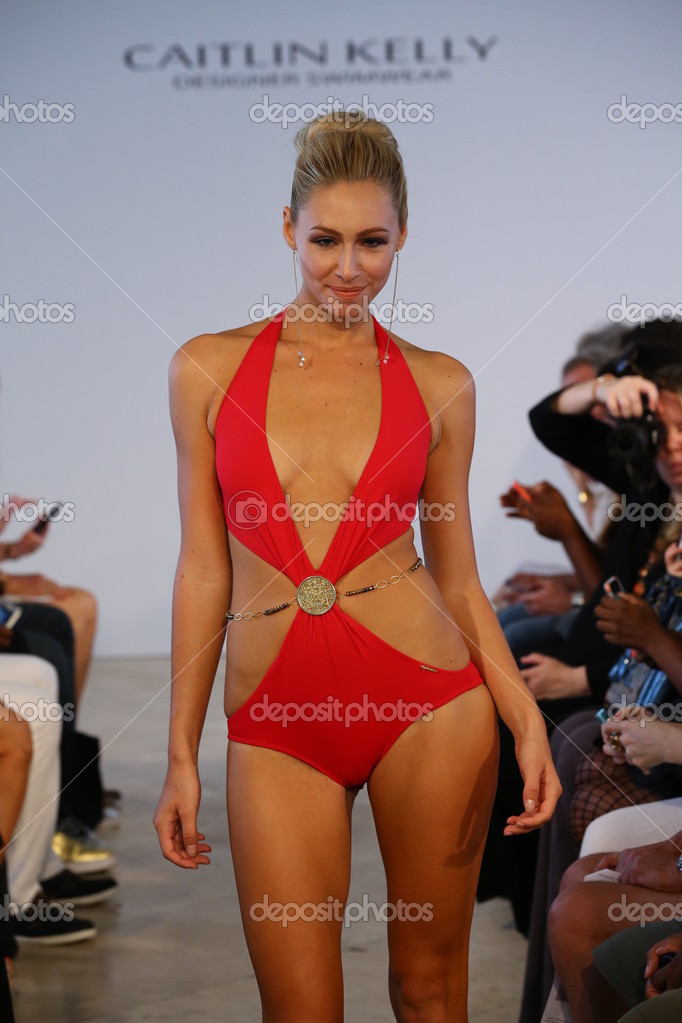 Model walks runway for Caitlin Kelly Swimwear — Stock Editorial Photo © fashionstock #50034739