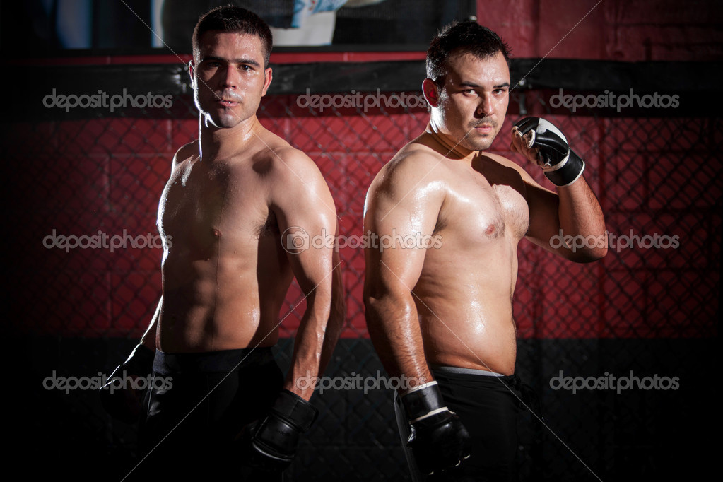 Two young boxers facing each other in a match Stock Photo by ©tonodiaz ...