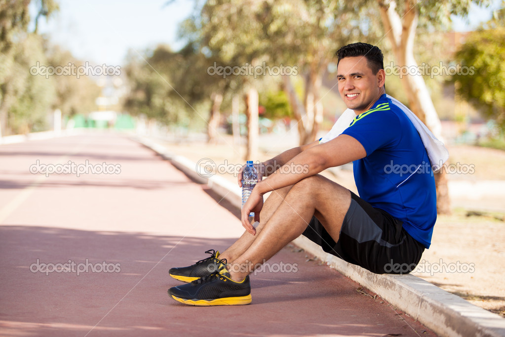 Man taking a water break Stock Photo by ©tonodiaz 39609777