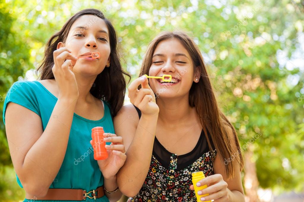 Friends acting all silly and blowing bubbles Stock Photo by ©tonodiaz ...