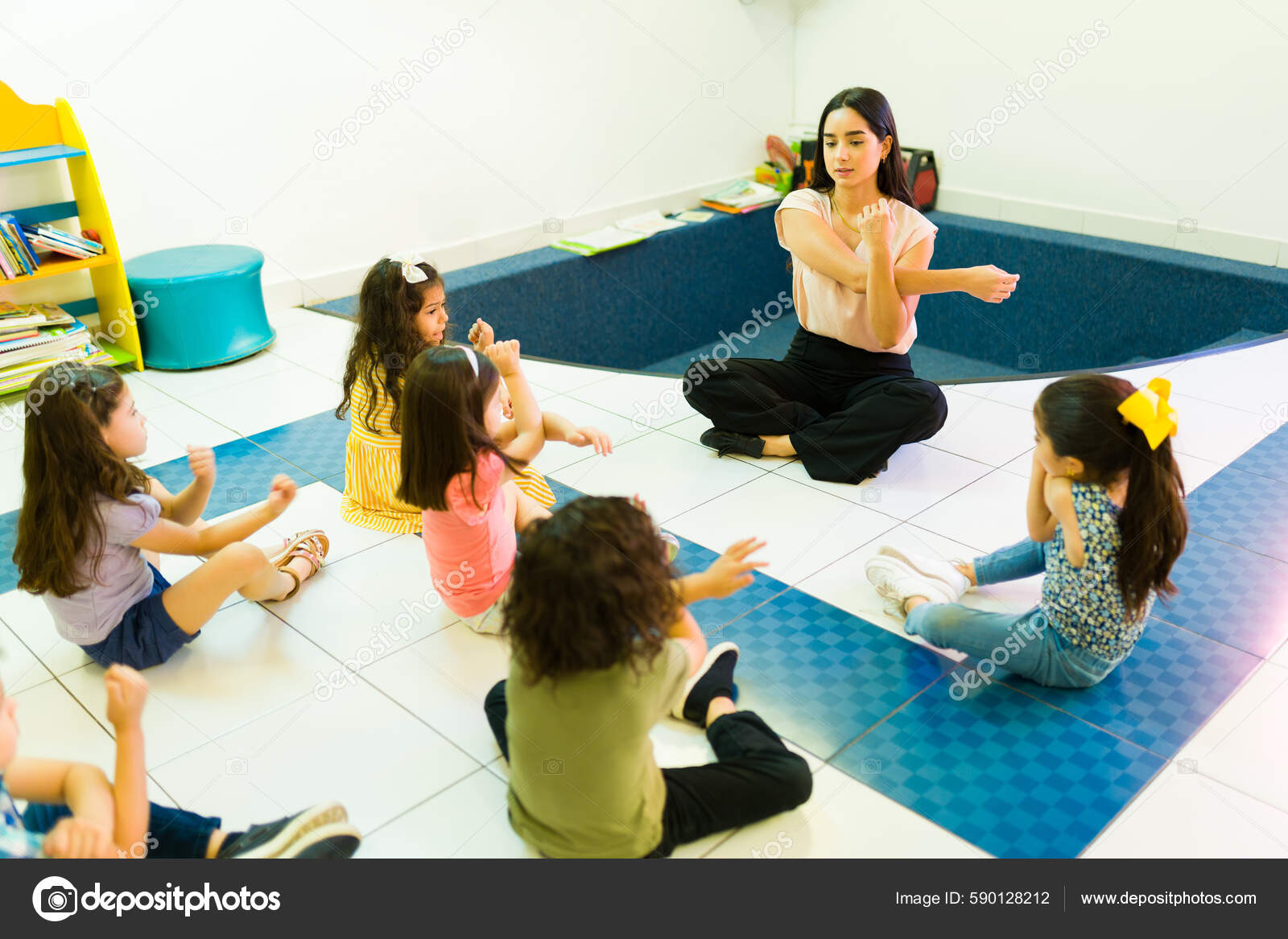 Kindergarten Children Stretching Arms Classroom Exercising Preschool ...