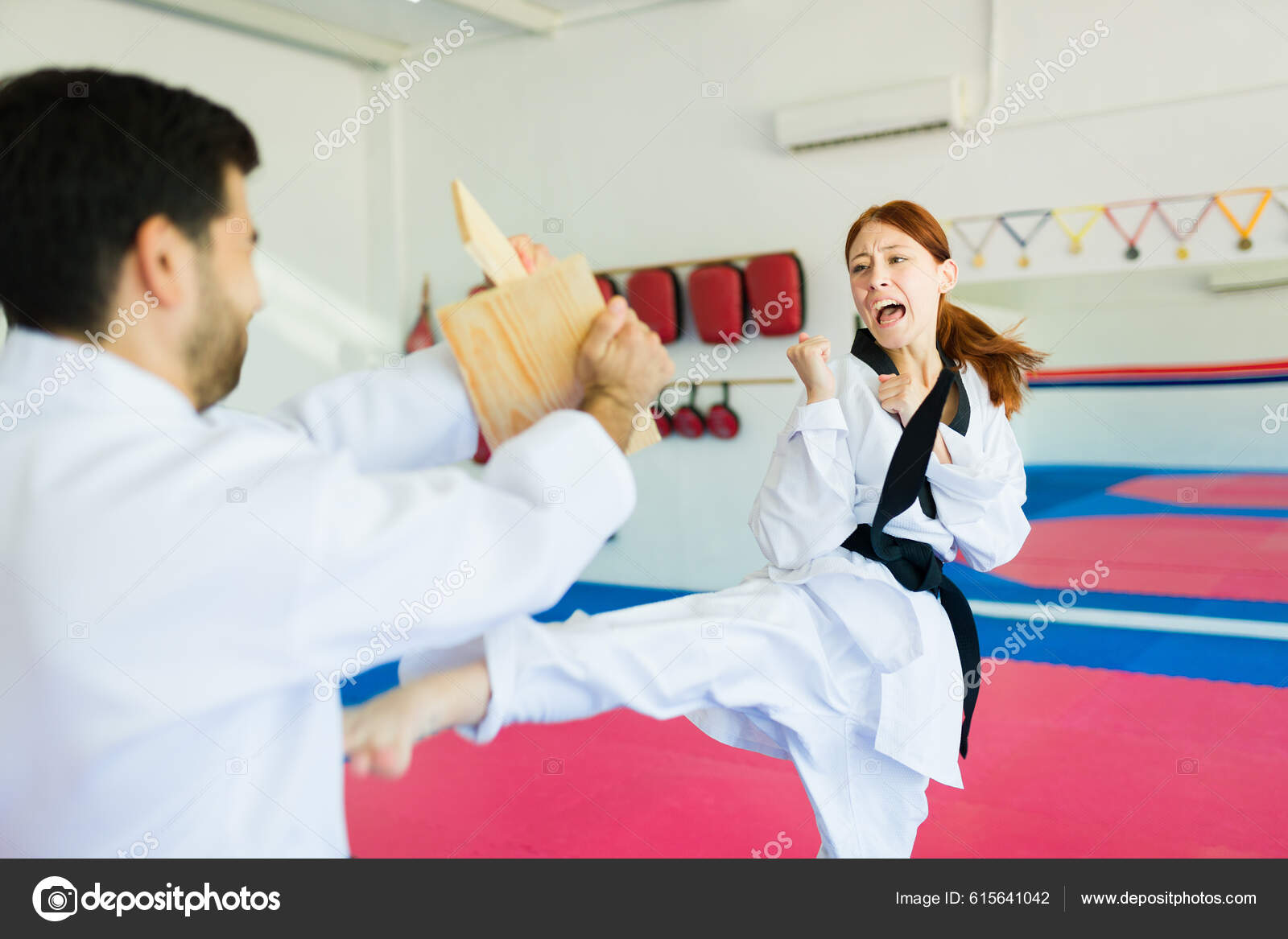 Caucasian Strong Woman Practicing Her Strong Kick Taekwondo Trainer ...